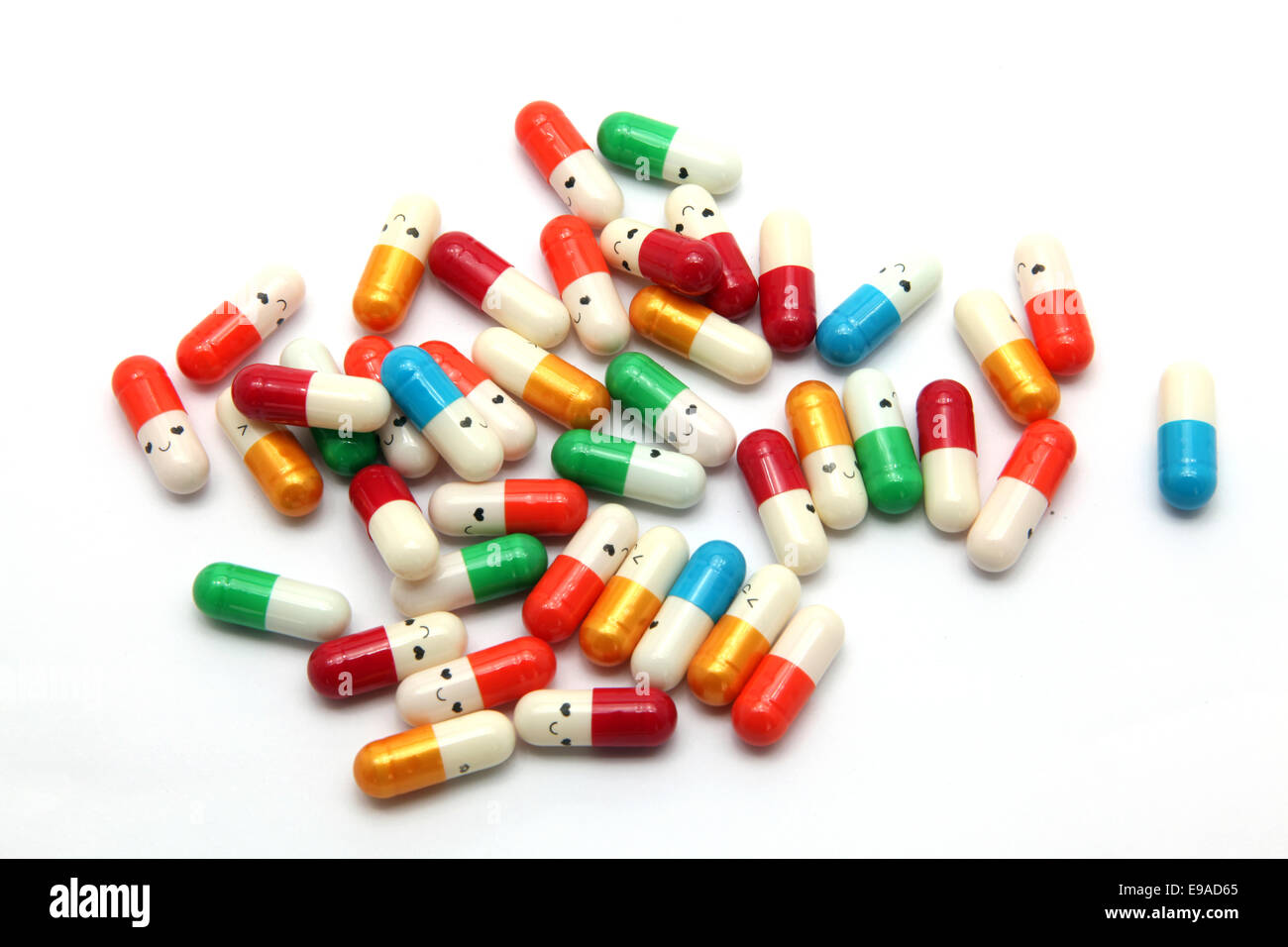 heap of smiling capsule Stock Photo - Alamy