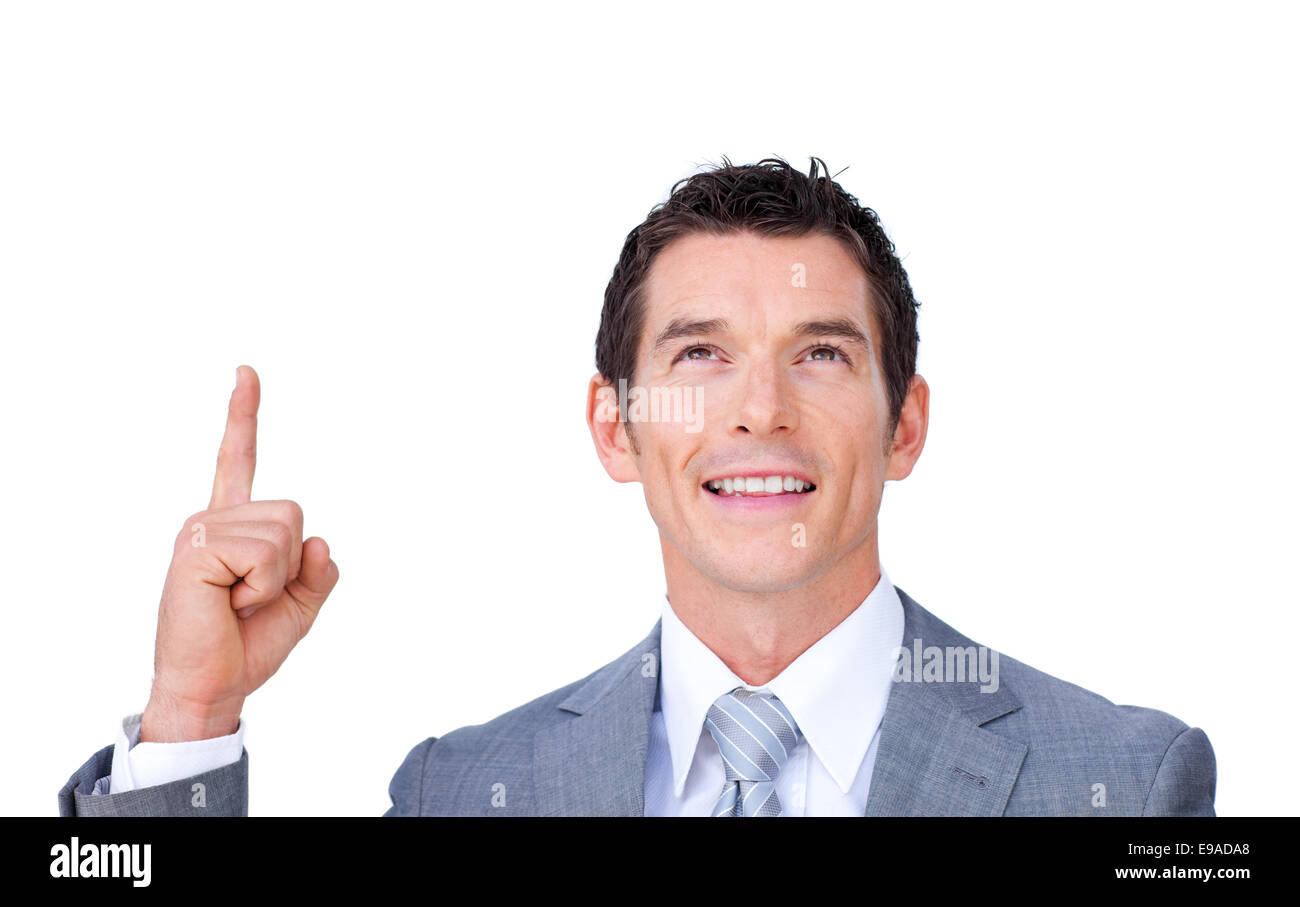 Positive businessman pointing upward Stock Photo - Alamy