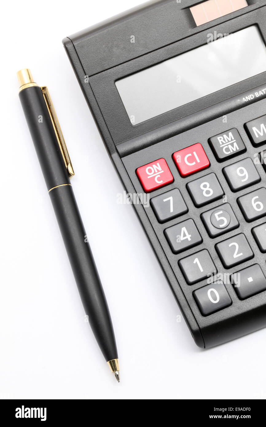 calculator and pen Stock Photo - Alamy