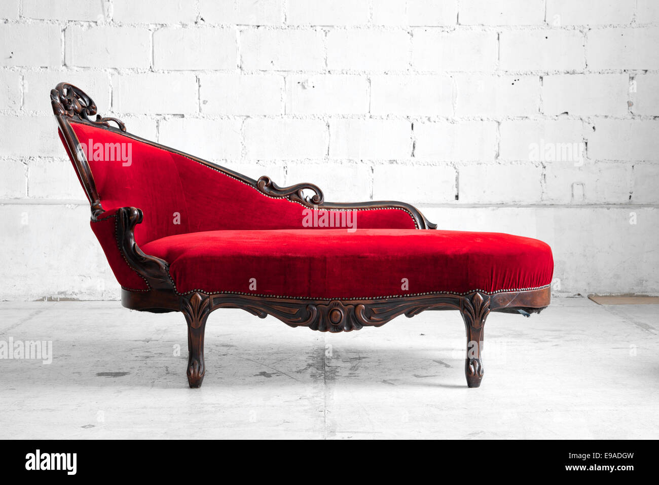 Modern red sofa Stock Photo - Alamy