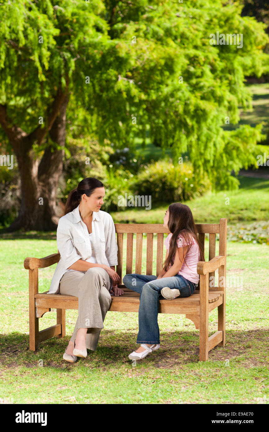 Mother and her daughter on the bench Stock Photo - Alamy