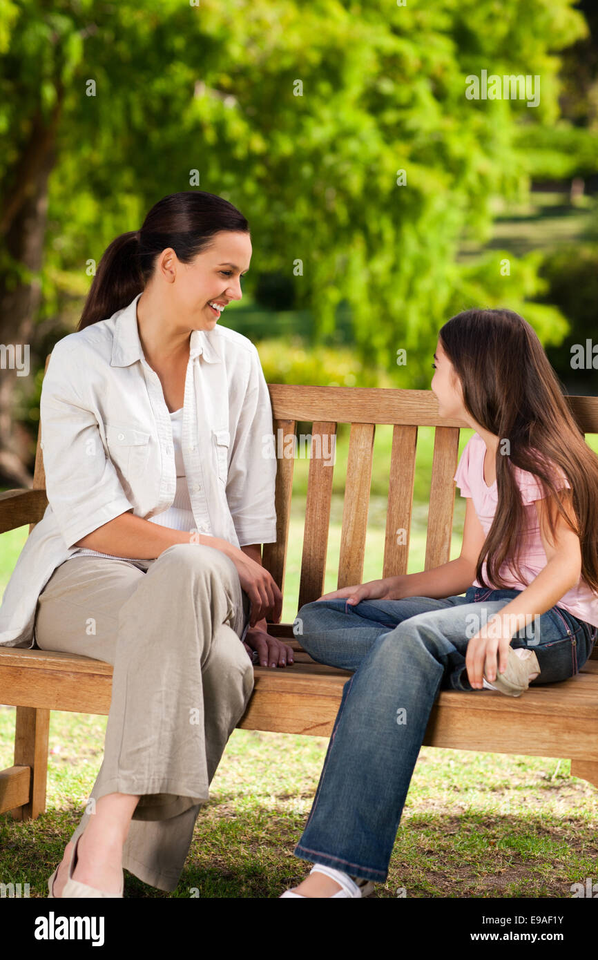 Mother and her daughter on the bench Stock Photo - Alamy