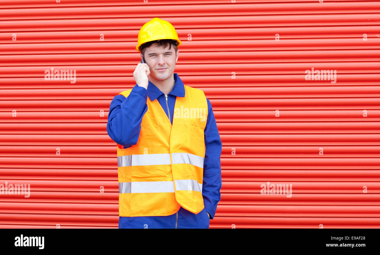 Engineer blueprints talking builder hi-res stock photography and images ...