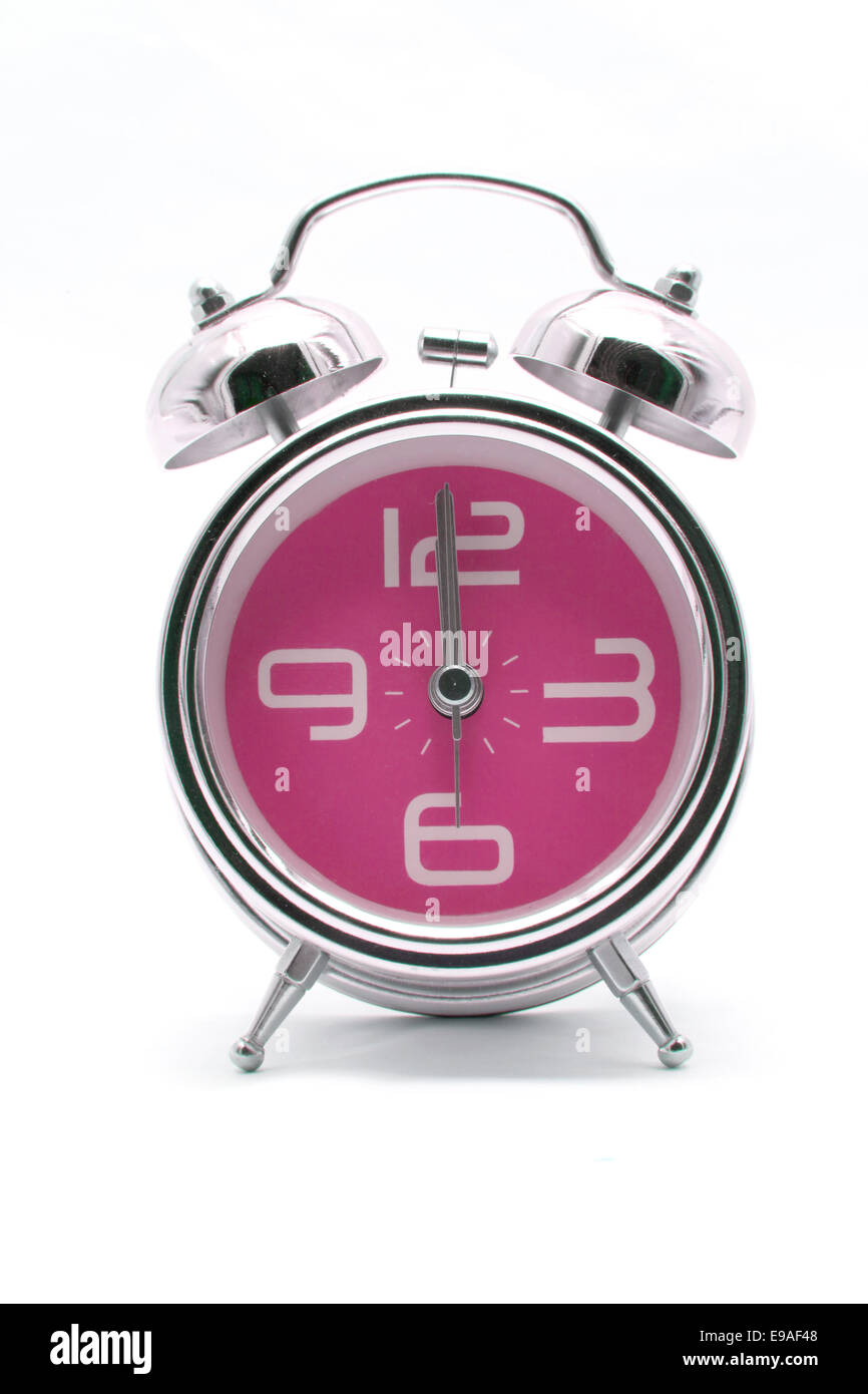 pink alarm clock front perspective Stock Photo - Alamy