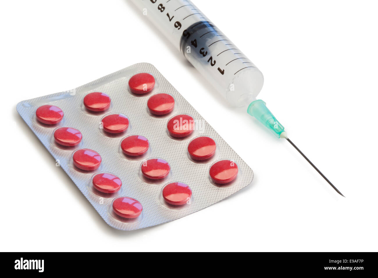 Blister strip and syringe Stock Photo - Alamy