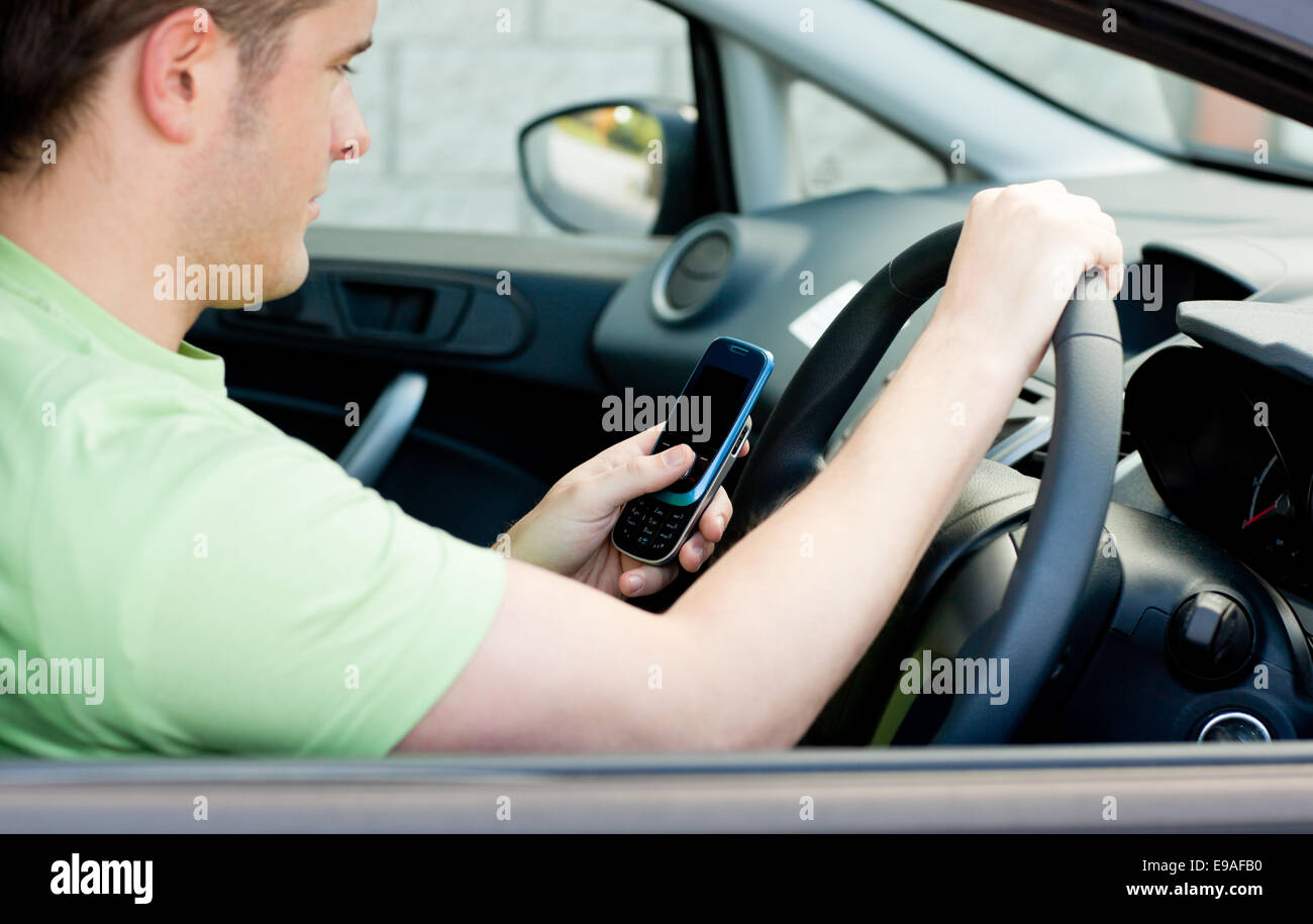Happy young male driver hi-res stock photography and images - Alamy