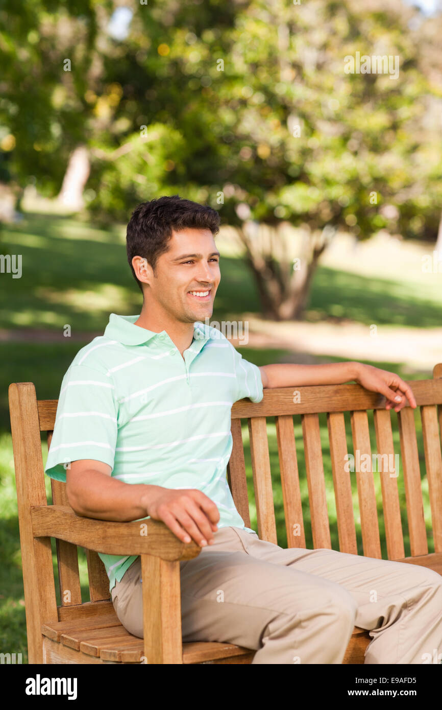 Handsome man on the bench Stock Photo - Alamy