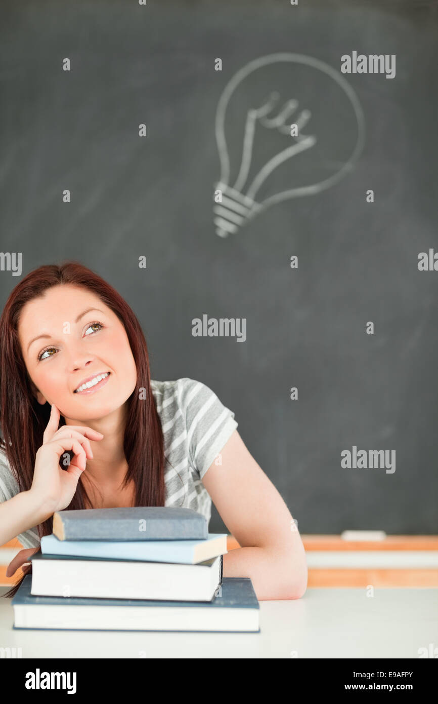 Clever young student in a classroom Stock Photo - Alamy