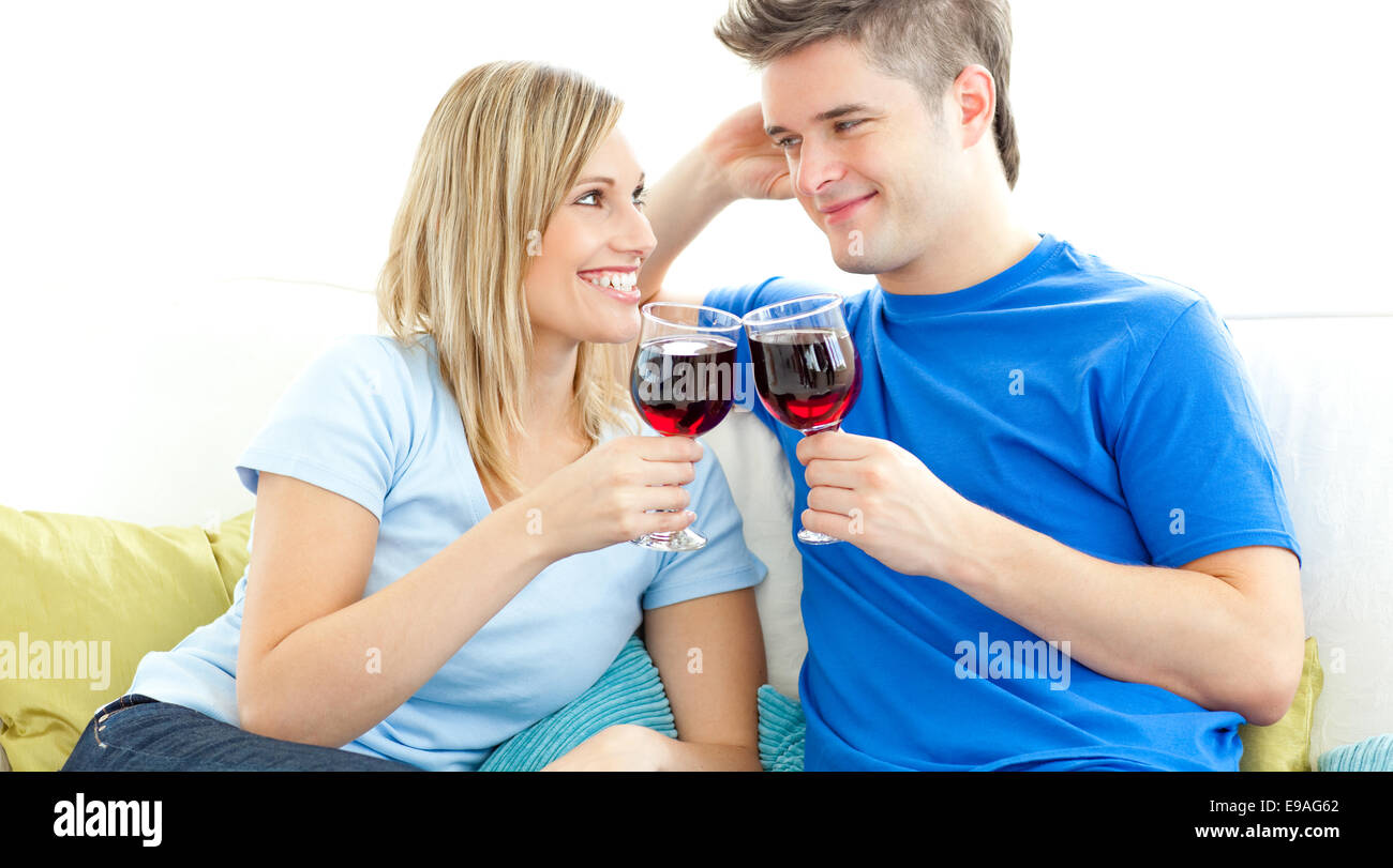 Charming couple drinking wine together Stock Photo - Alamy