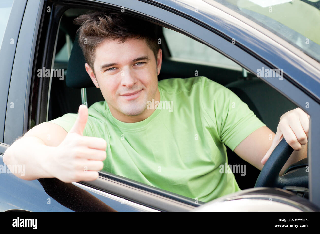 Handsome male driver sitting hi-res stock photography and images - Alamy