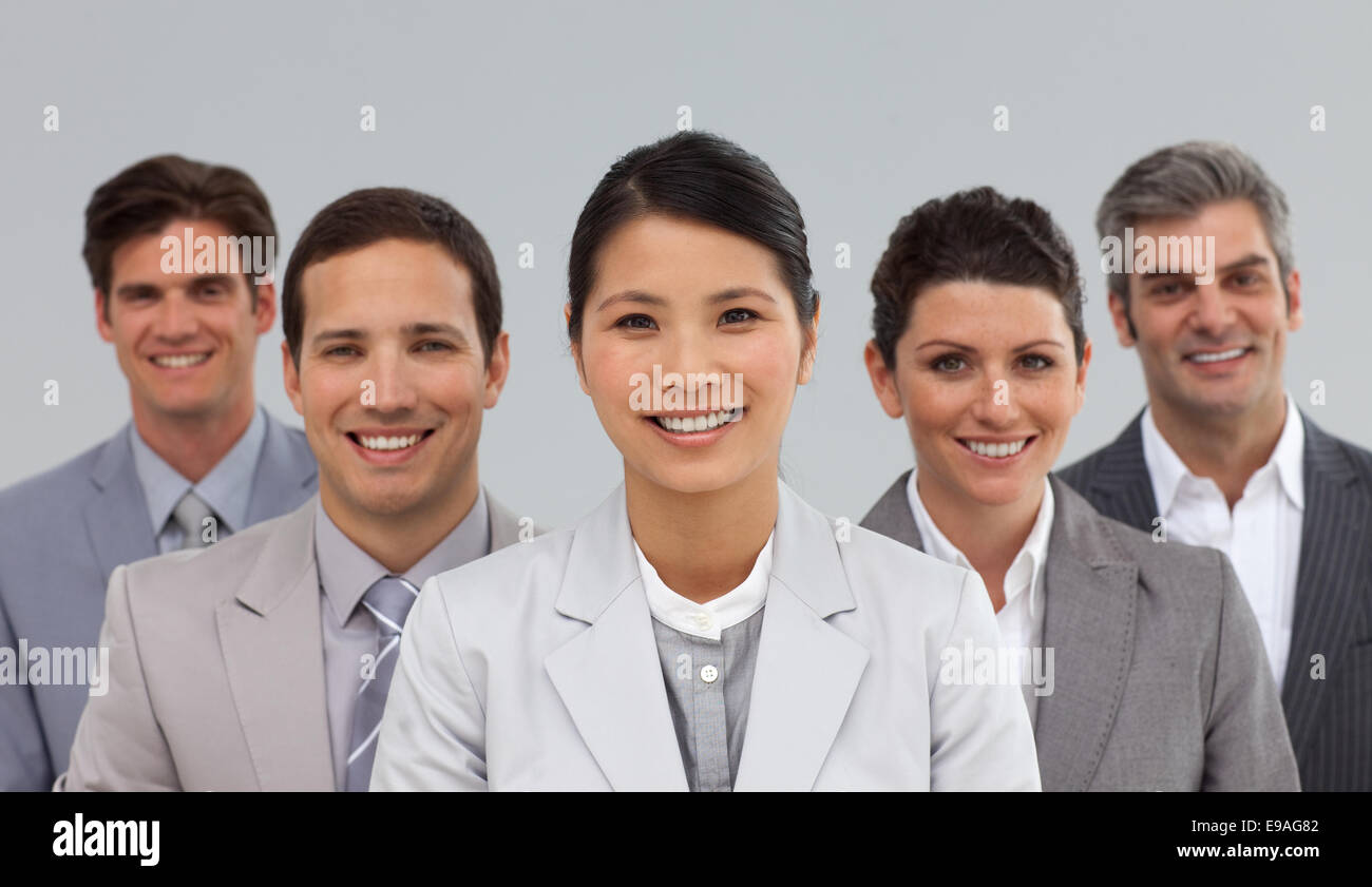 Multi-ethnic business people standing together Stock Photo - Alamy