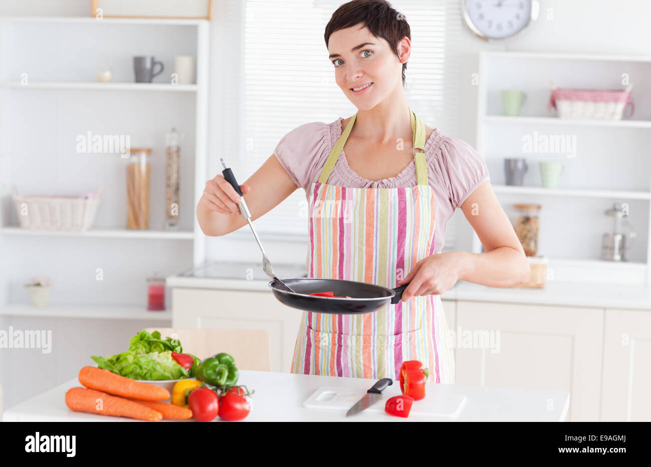 Gorgeous woman cooking Stock Photo - Alamy