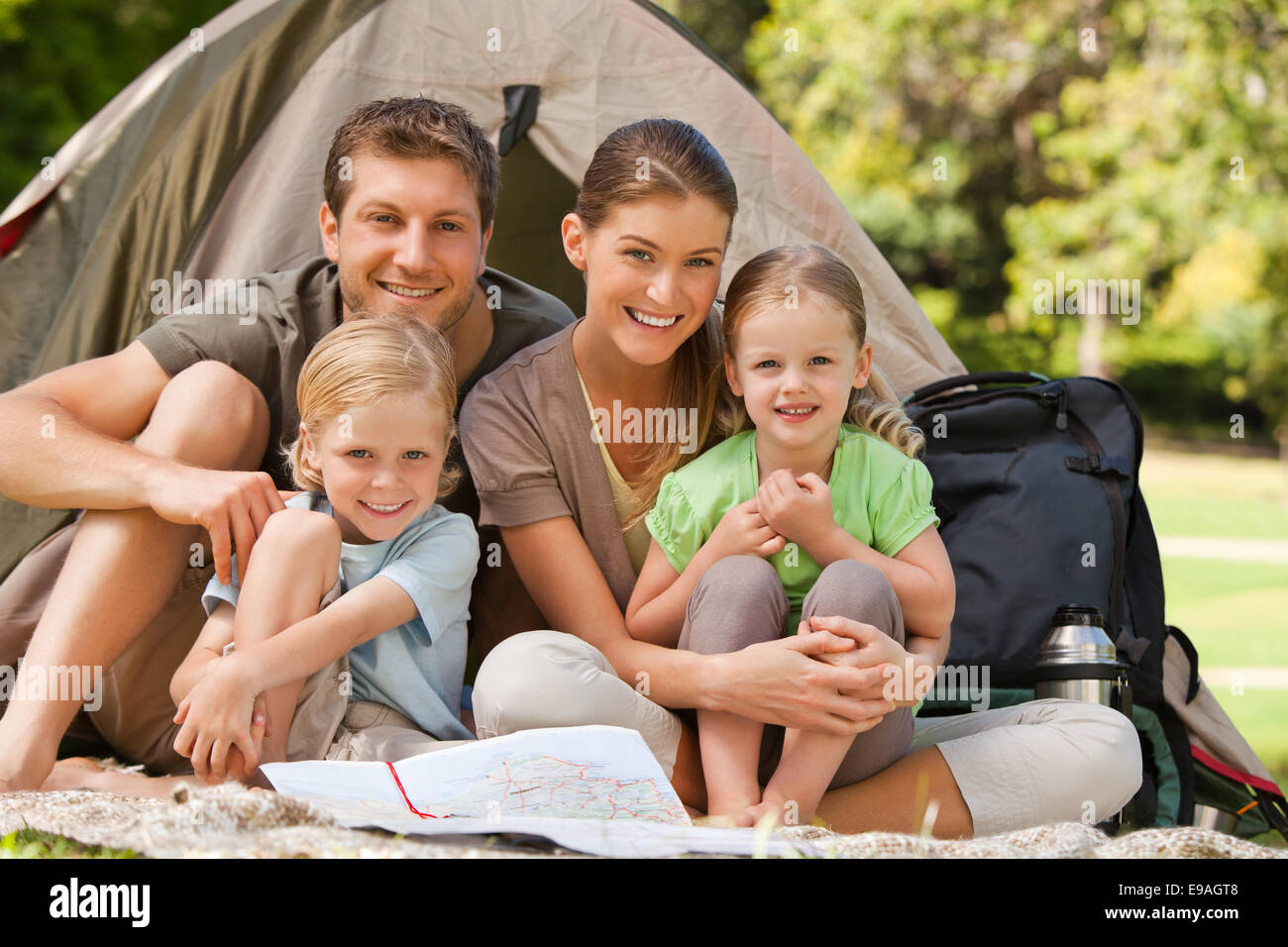 Family camping in the park Stock Photo - Alamy