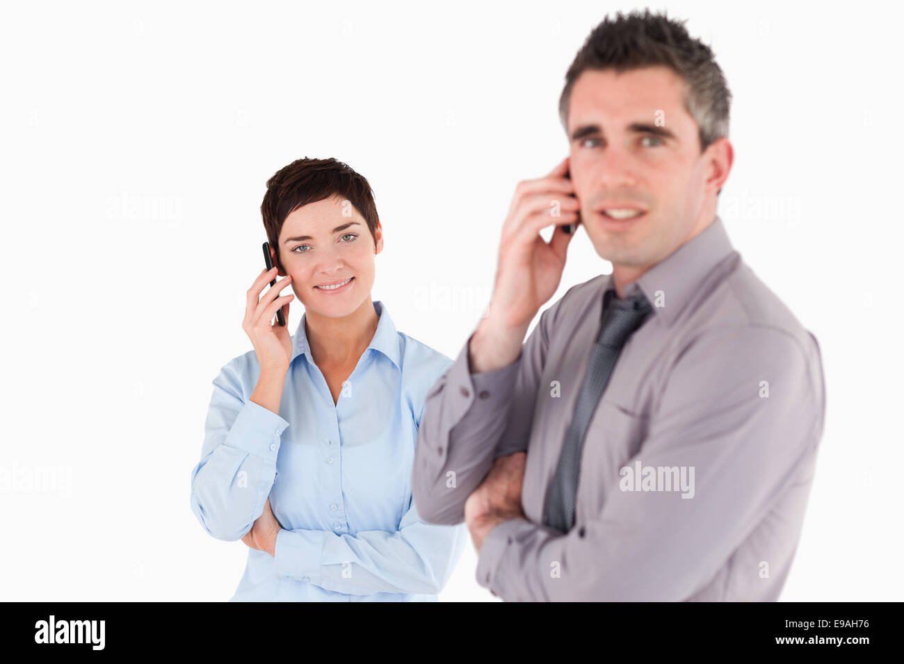 Managers making a phone call Stock Photo - Alamy