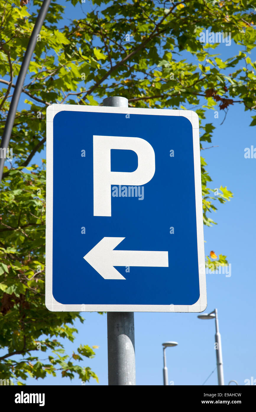 Blue Parking Sign in Urban Setting Stock Photo - Alamy