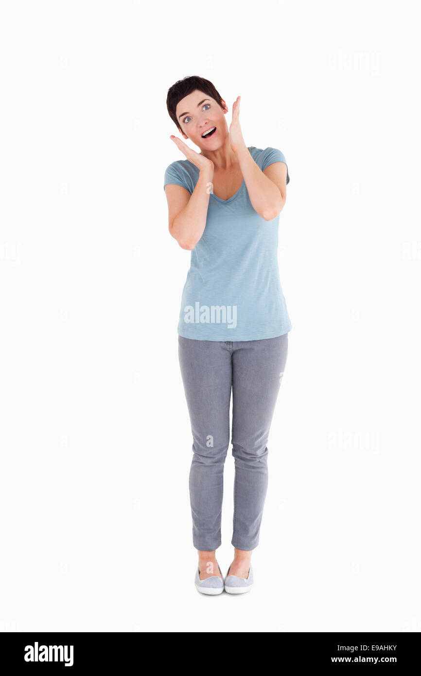 Surprised woman posing Stock Photo - Alamy