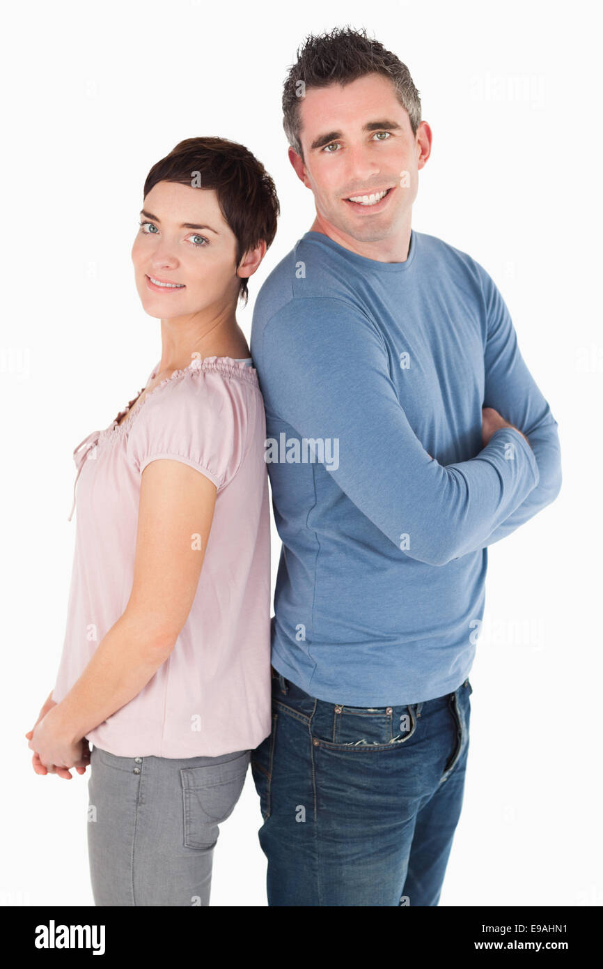 Fashion couple posing back back hi-res stock photography and images - Alamy