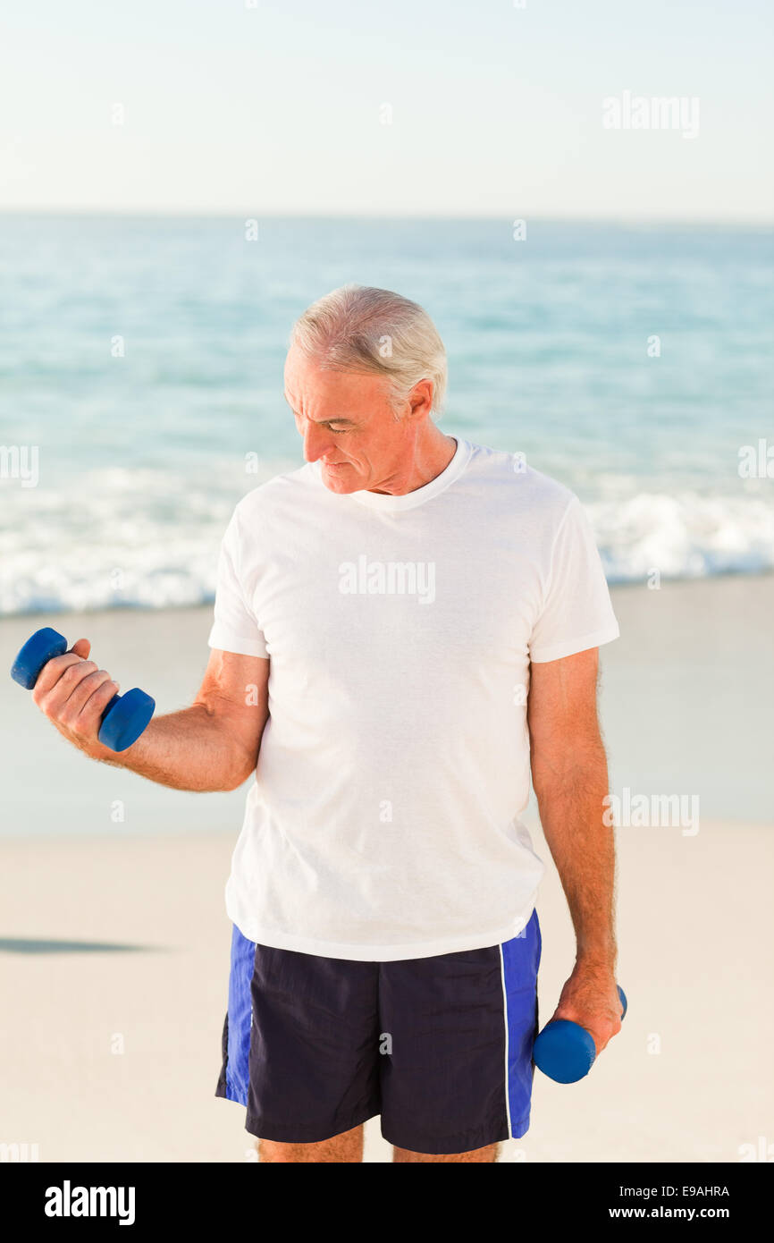 Older man doing exercise outdoors hi-res stock photography and images ...