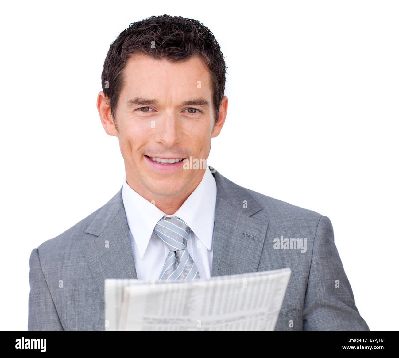 Smiling businessman reading a newspaper Stock Photo - Alamy