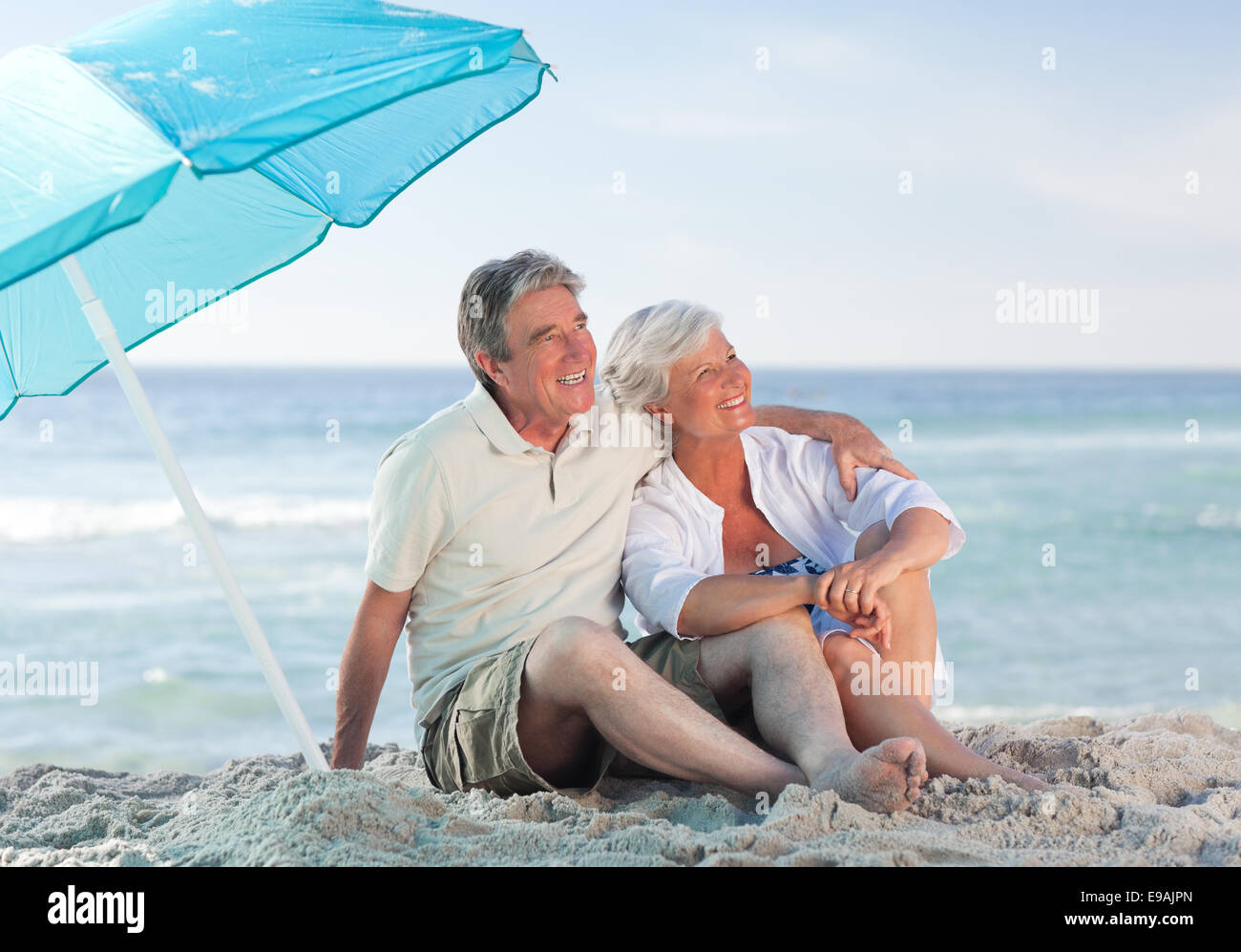 Mature couple on the beach Stock Photo - Alamy