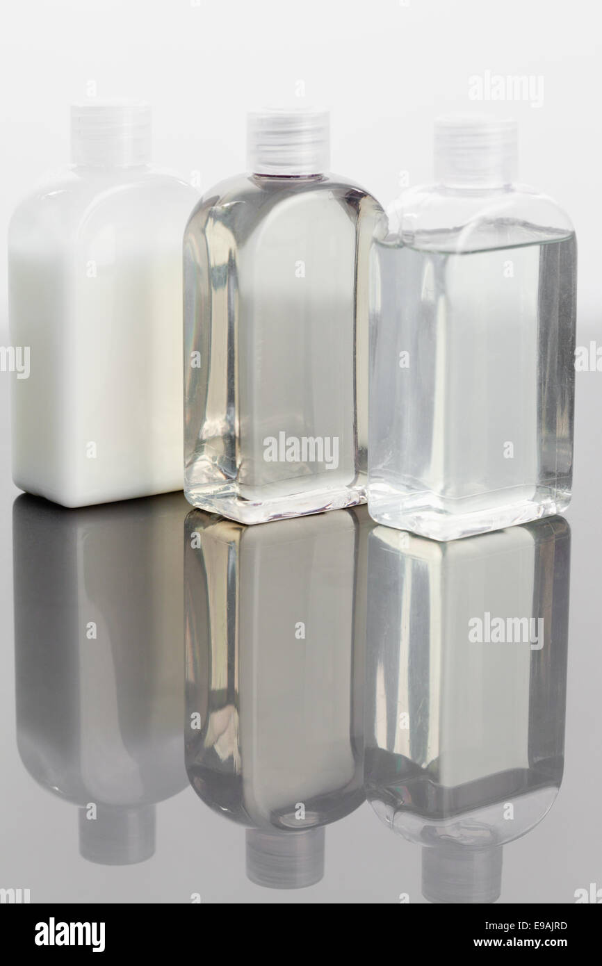 Glass phials on a mirror Stock Photo - Alamy