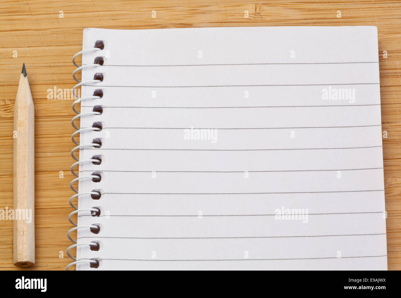 Notebook and pencil Stock Photo - Alamy