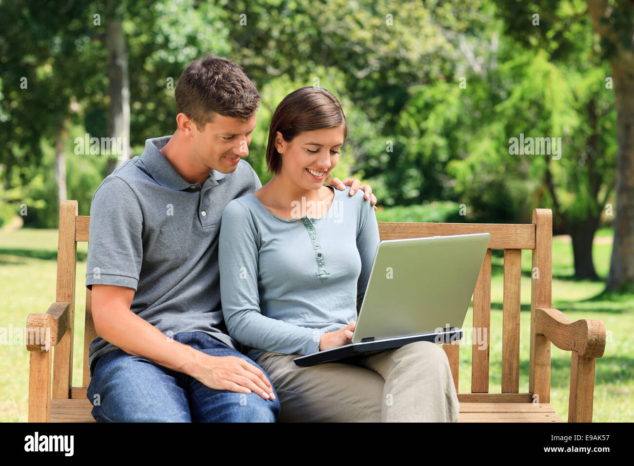 Couple working on their laptop Stock Photo - Alamy
