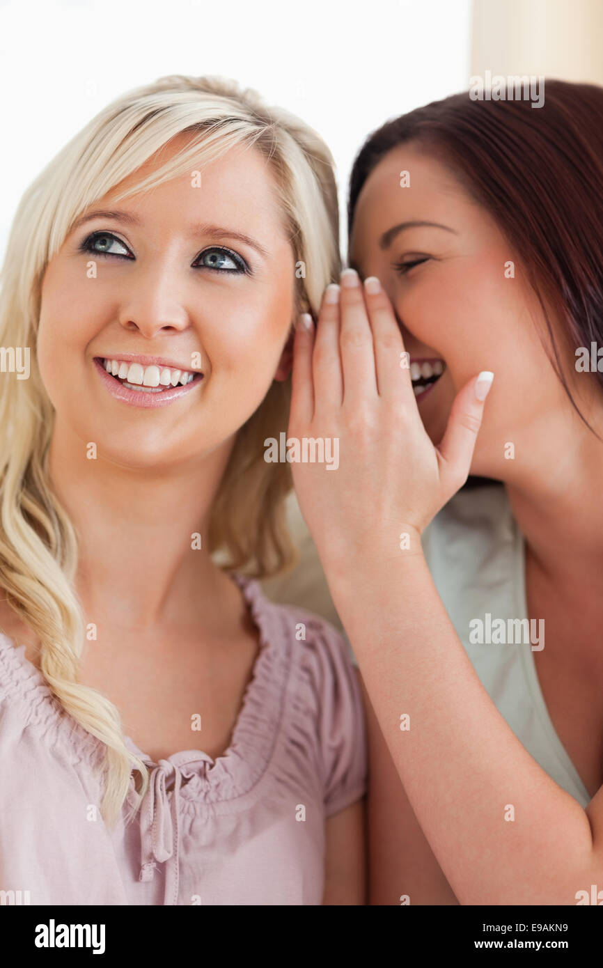 Woman telling a secret hi-res stock photography and images - Alamy