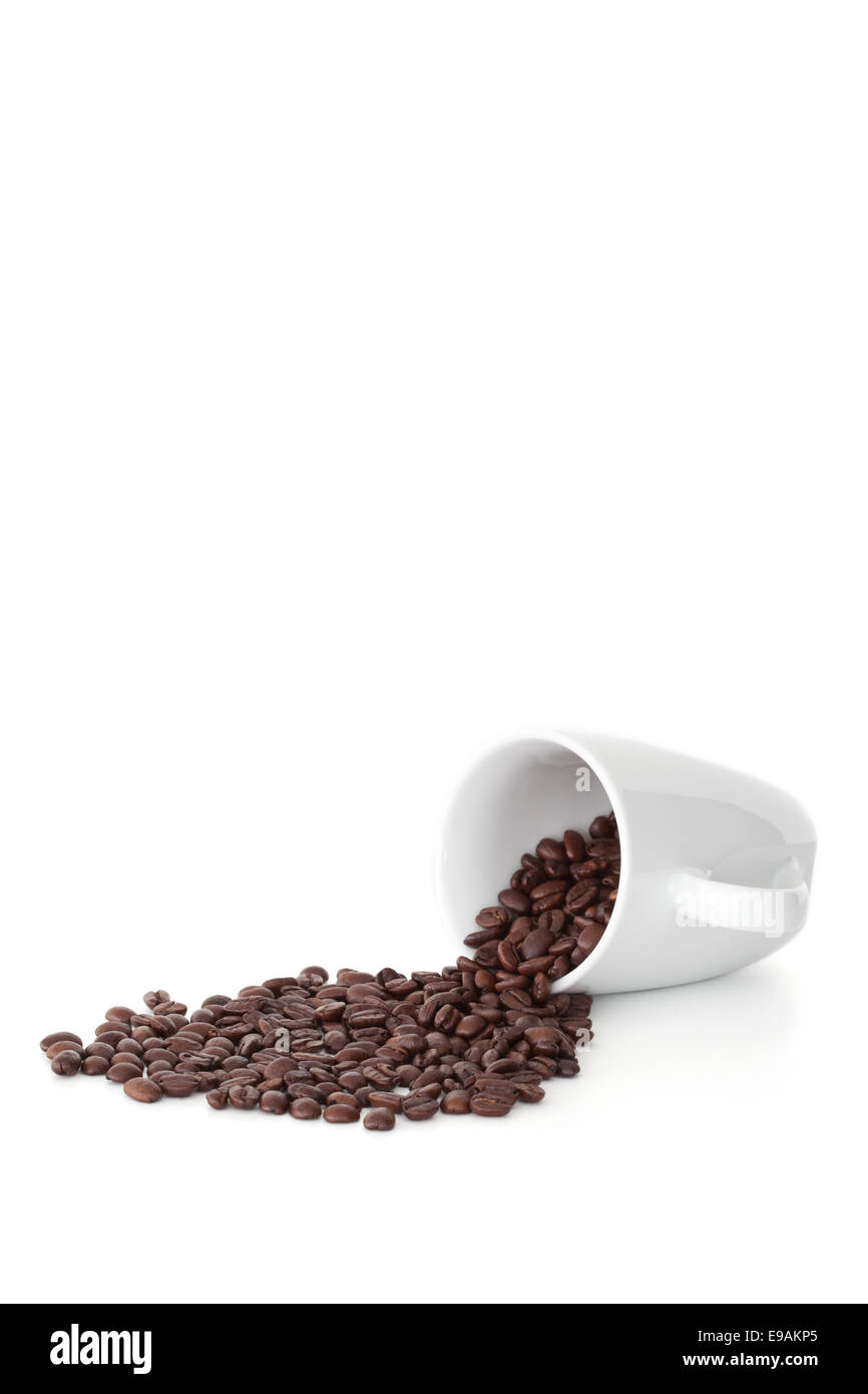 Spilled cup of coffee beans Stock Photo - Alamy