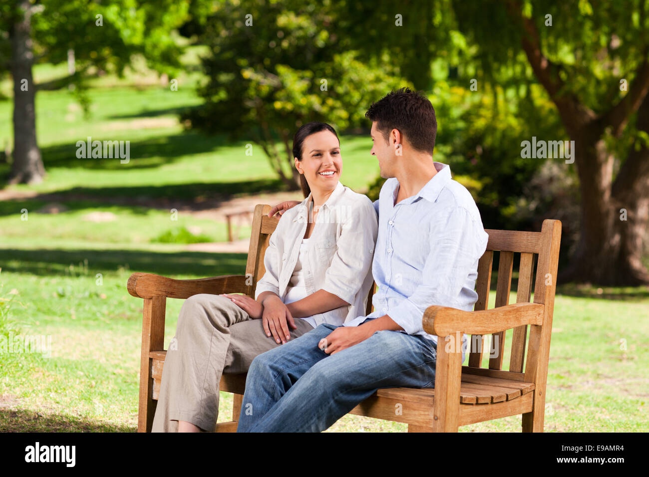 Couple on the bench Stock Photo - Alamy