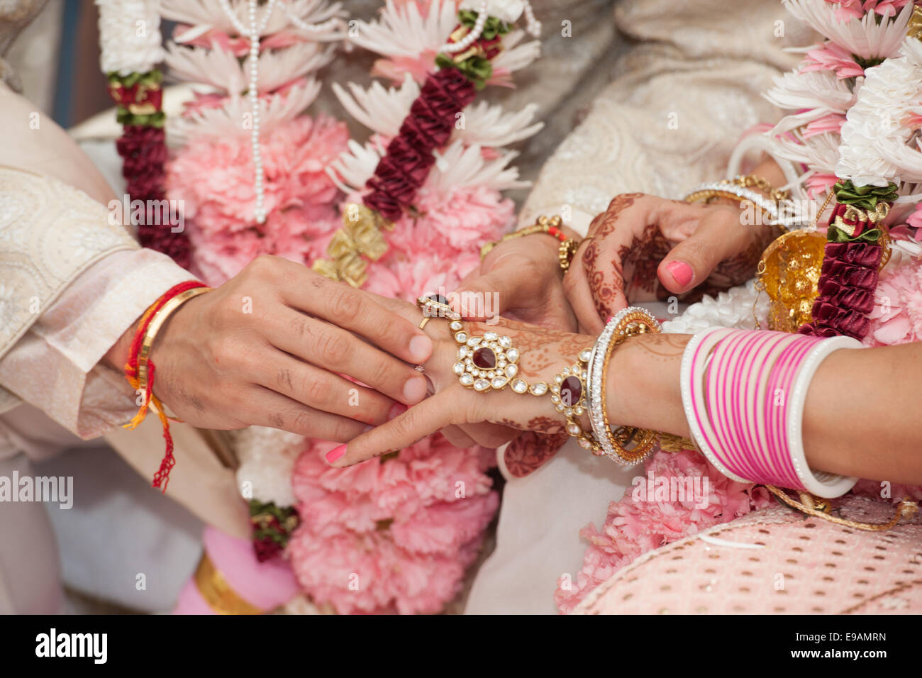 Indian Hindu Wedding with garlands of flowers beauty colours and ...