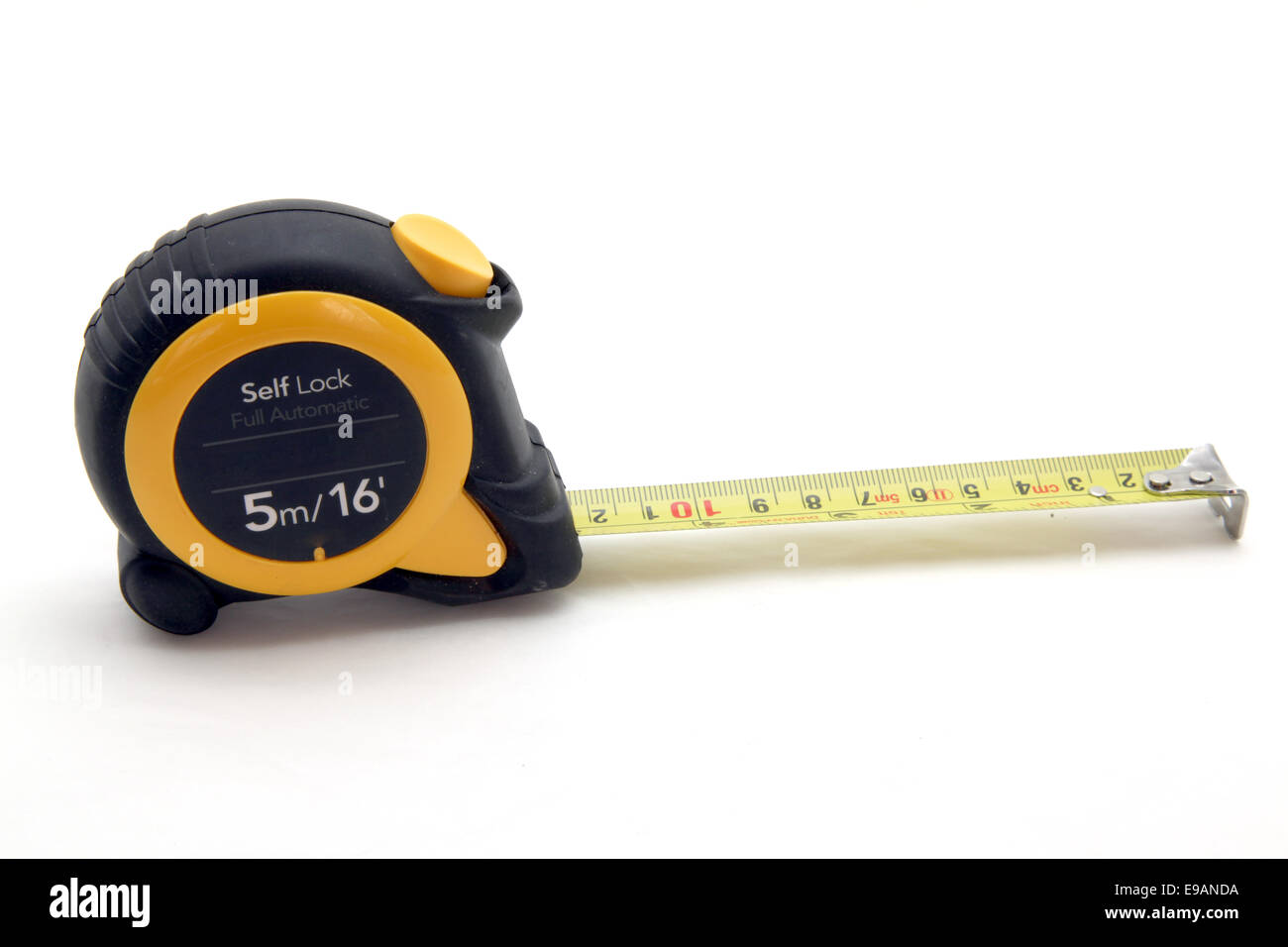 isolated yellow measuring tape on white Stock Photo - Alamy
