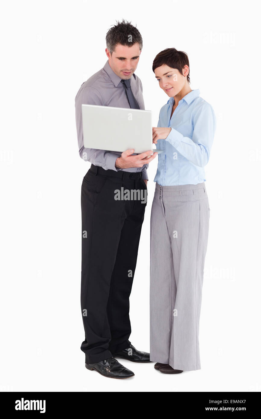 Office workers using a laptop Stock Photo - Alamy