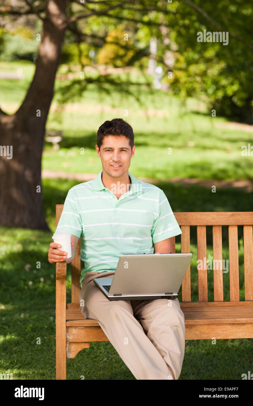 Man working on his laptop Stock Photo - Alamy
