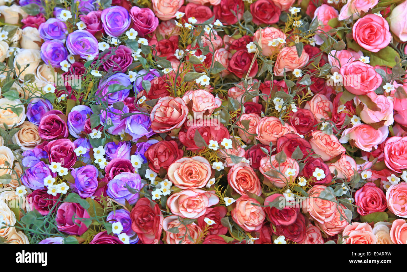 fake flowers background Stock Photo - Alamy
