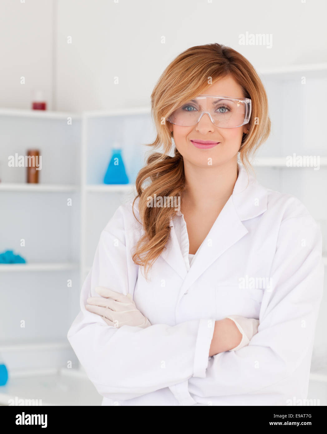 Cute blond-haired scientist posing Stock Photo - Alamy