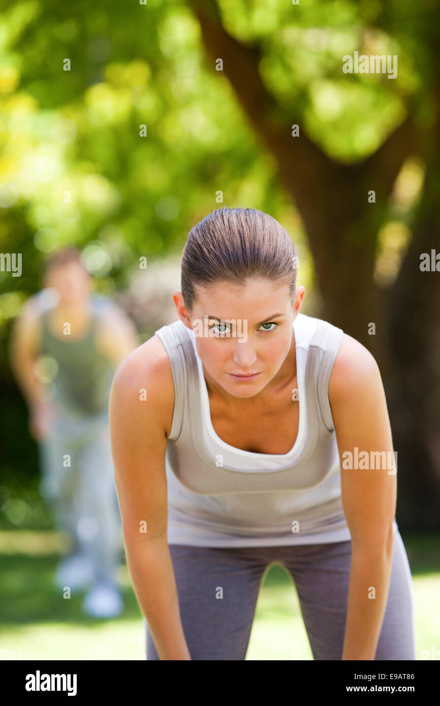 Tired couple in the park Stock Photo - Alamy
