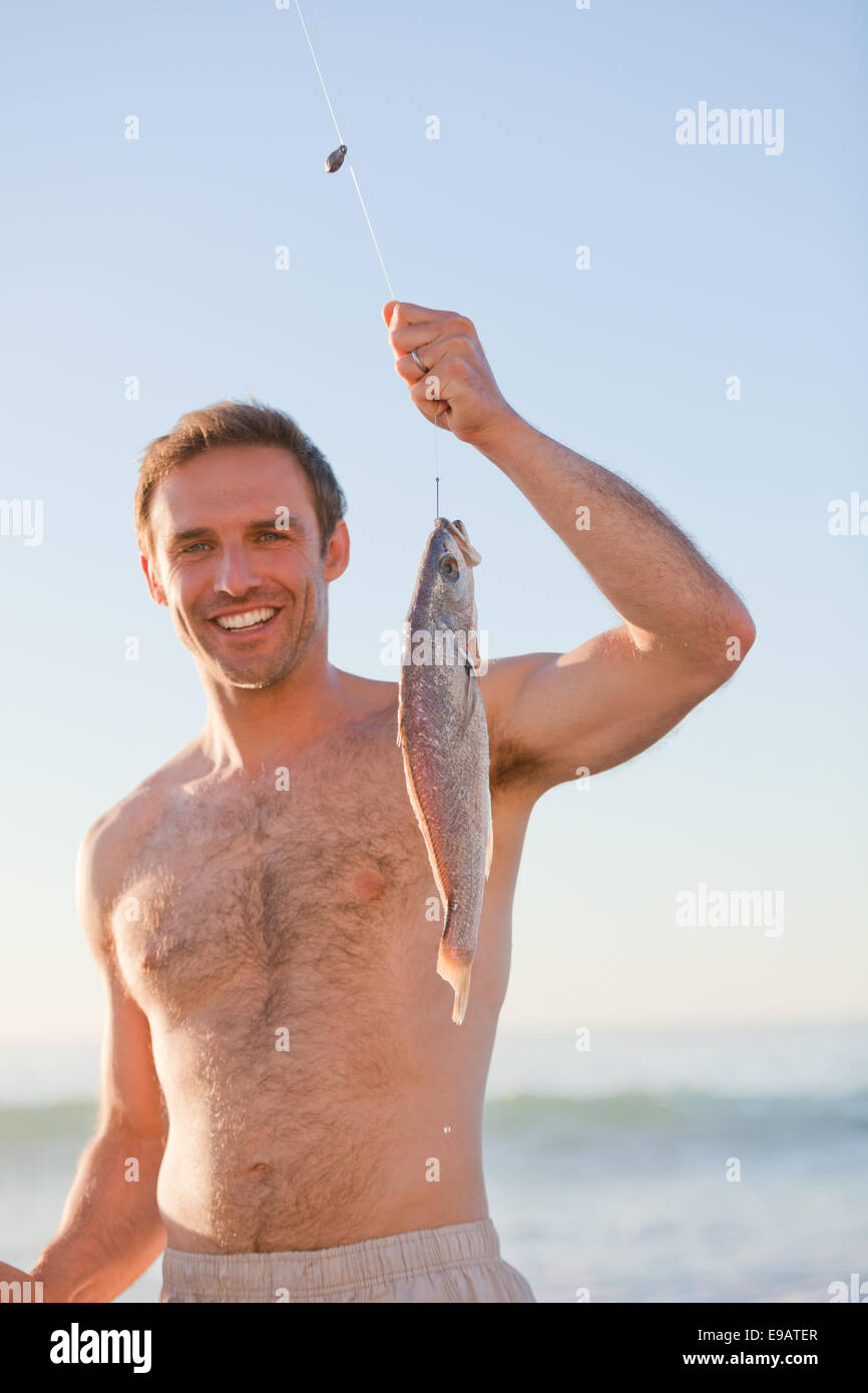Active man fishing Stock Photo - Alamy