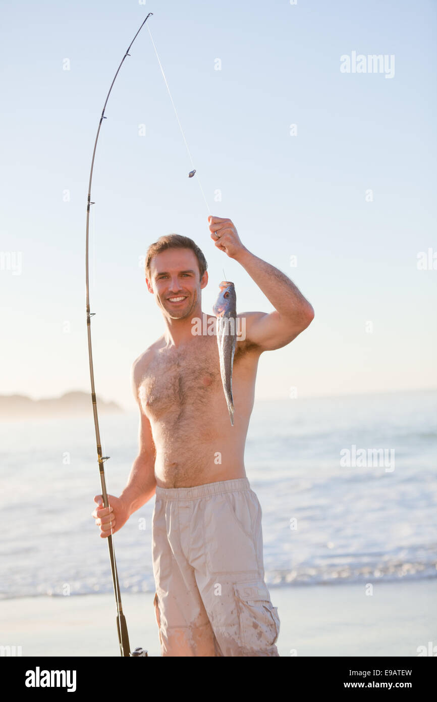Active man fishing Stock Photo - Alamy