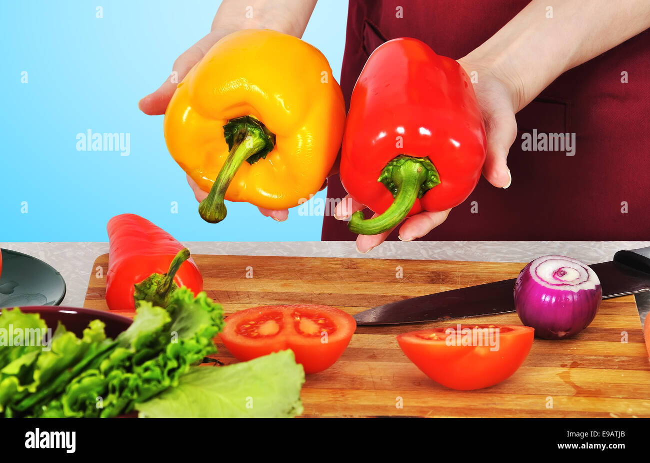 cook holding pepper in hand, close up Stock Photo - Alamy