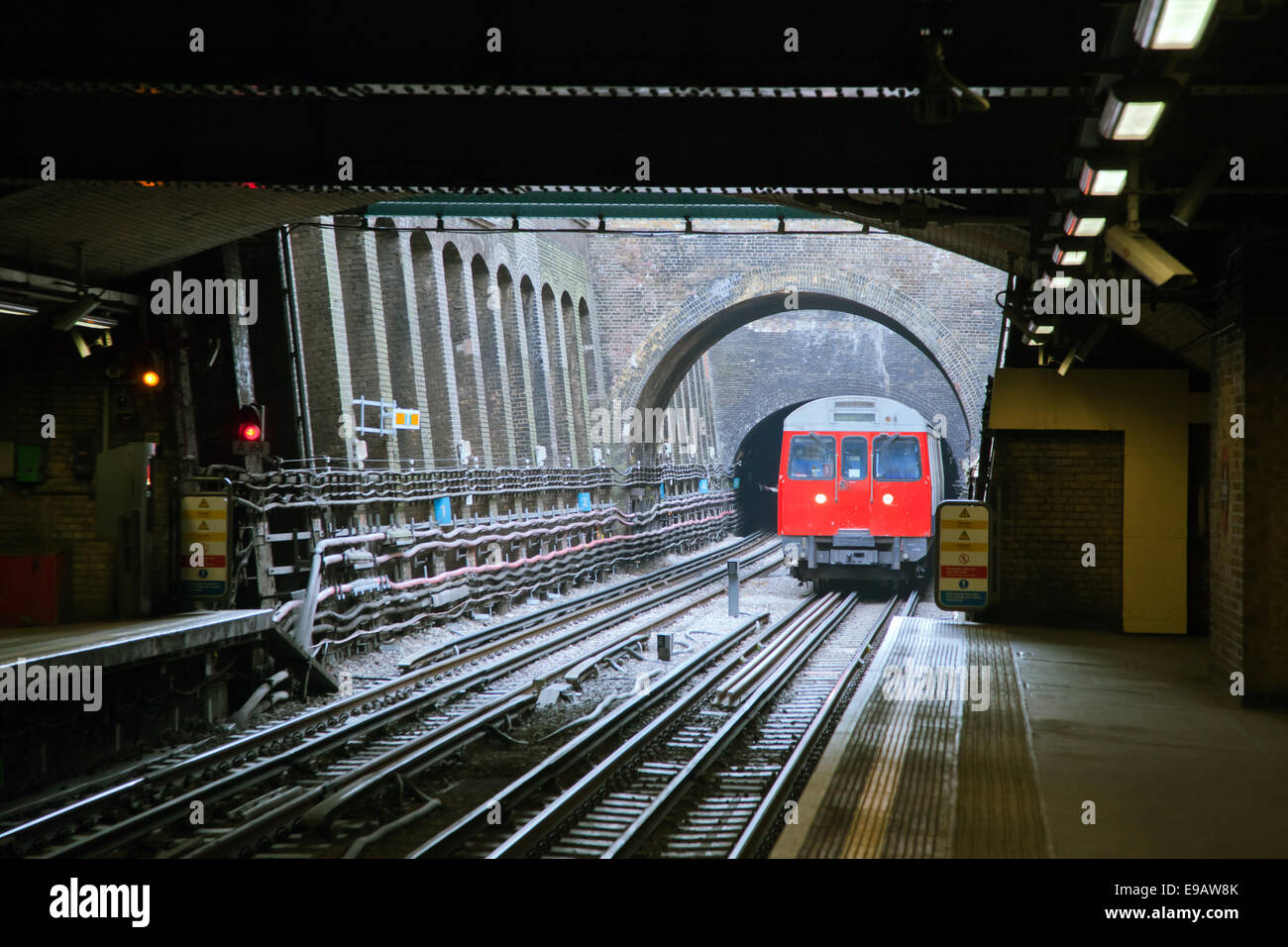 Red Train in London Stock Photo - Alamy