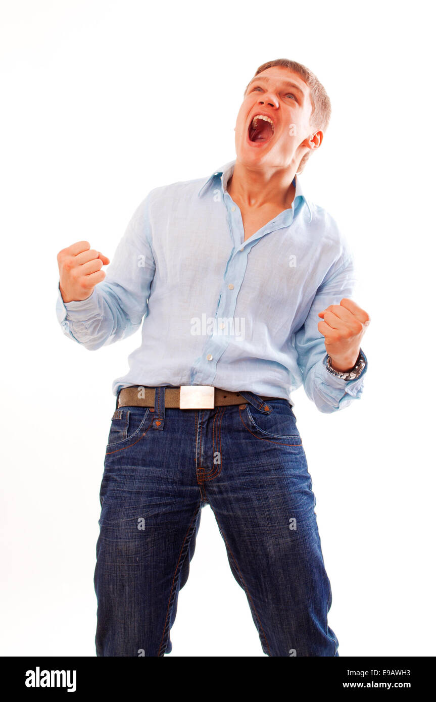 Portrait of young man celebrating success isolated over white ...