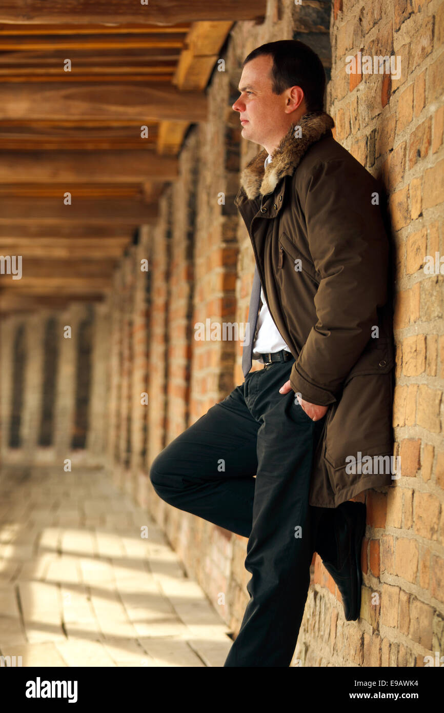 Portrait of a handsome young man standing - outdoor Stock Photo - Alamy