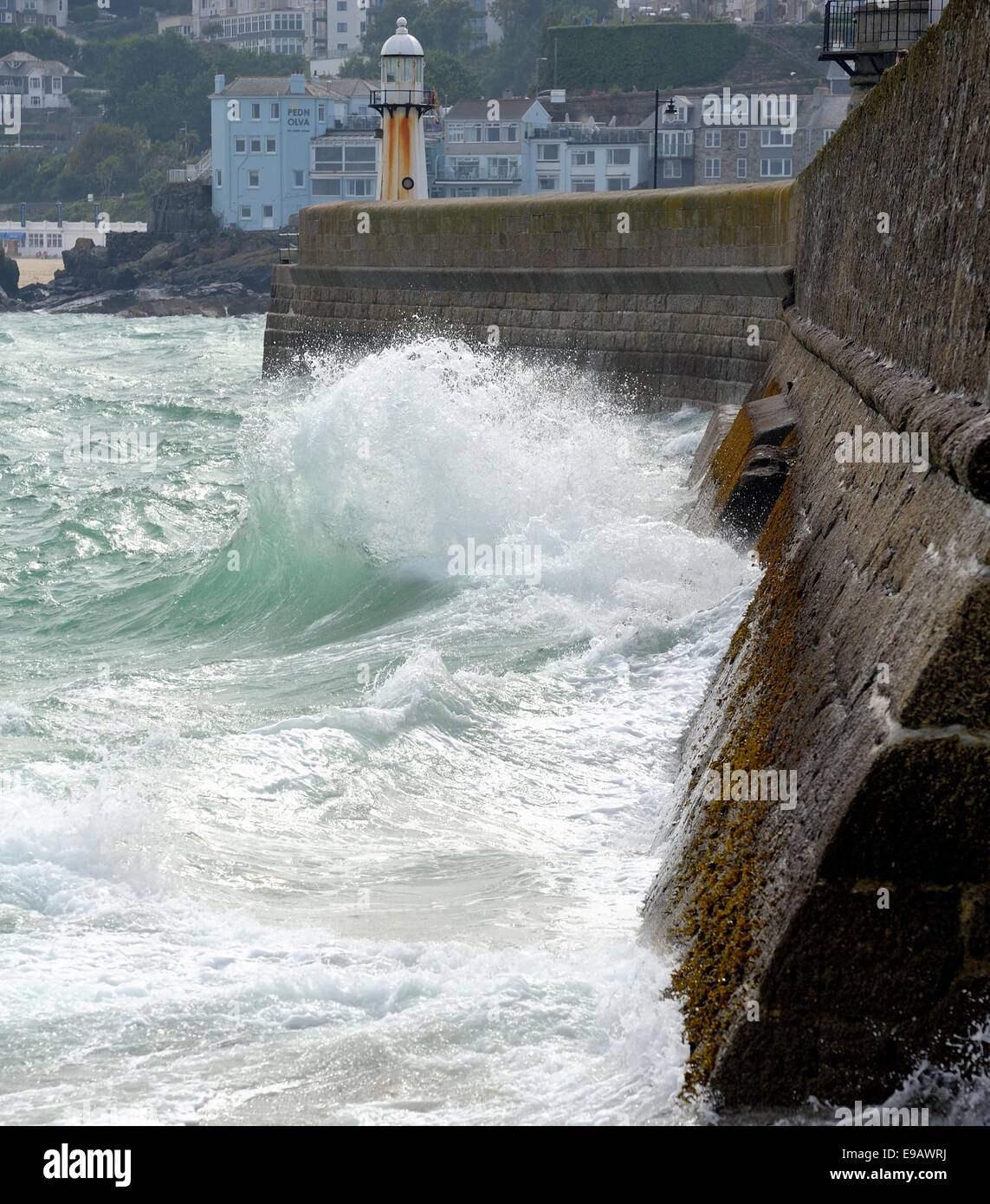 Waves crashing on the sea wall St Ives Cornwall England uk Stock Photo ...