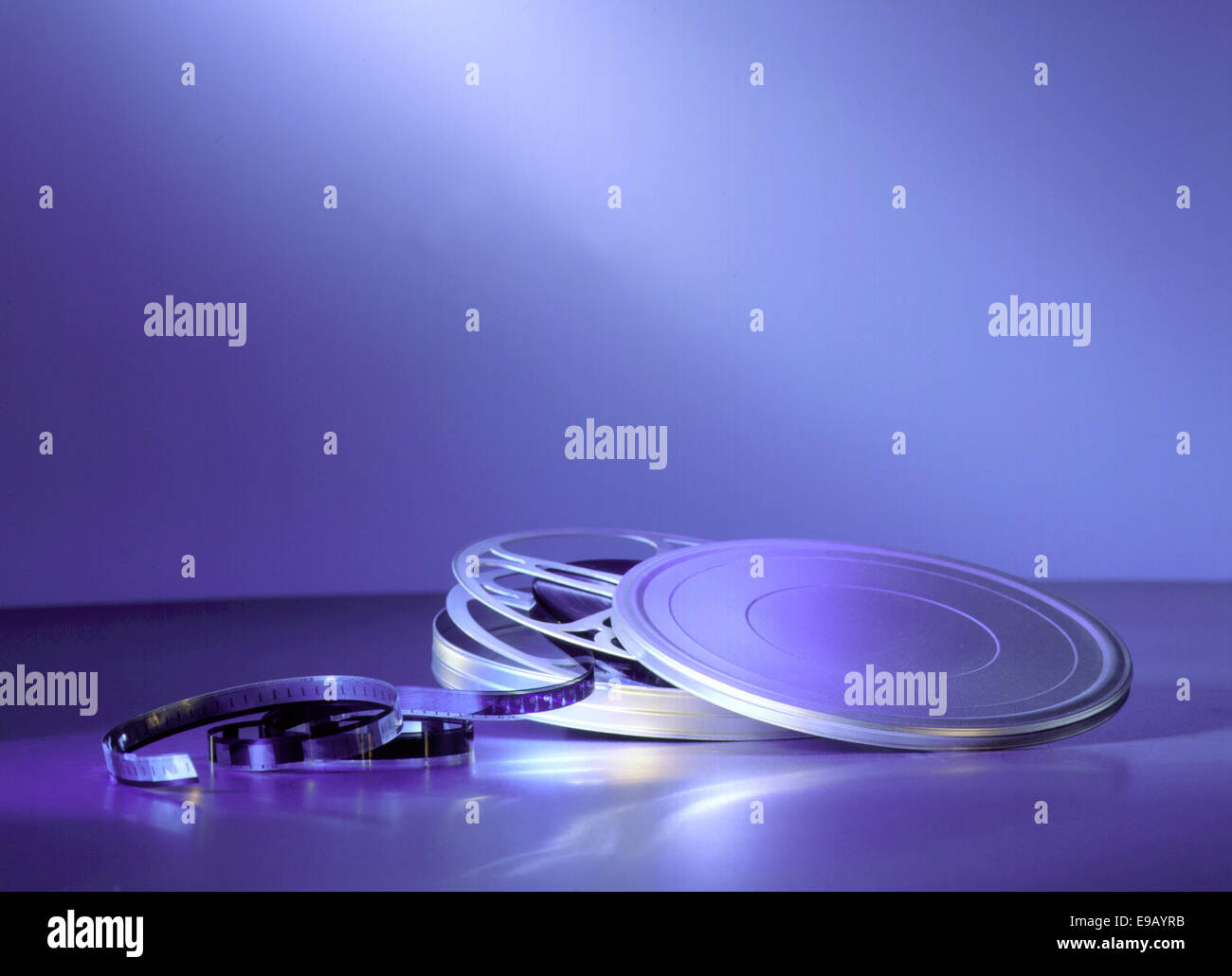 Metal movie film canister with a film reel Stock Photo - Alamy