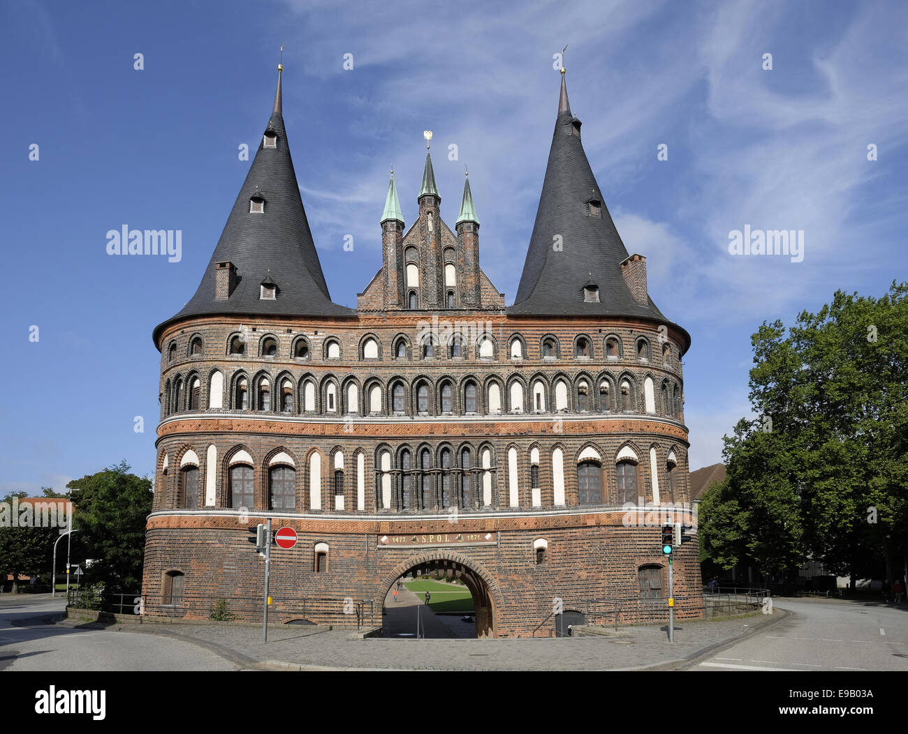 The holsten gate is the landmark of the city hi-res stock photography ...