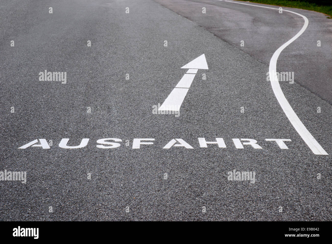 Label "Ausfahrt" or "exit" on asphalt Stock Photo - Alamy