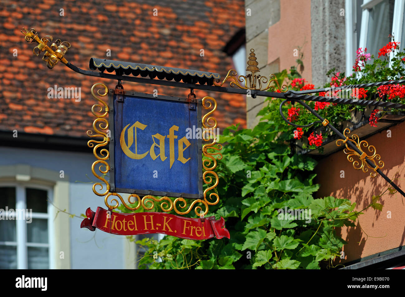 Hanging sign of a café, Rothenburg ob der Tauber, Middle Franconia ...