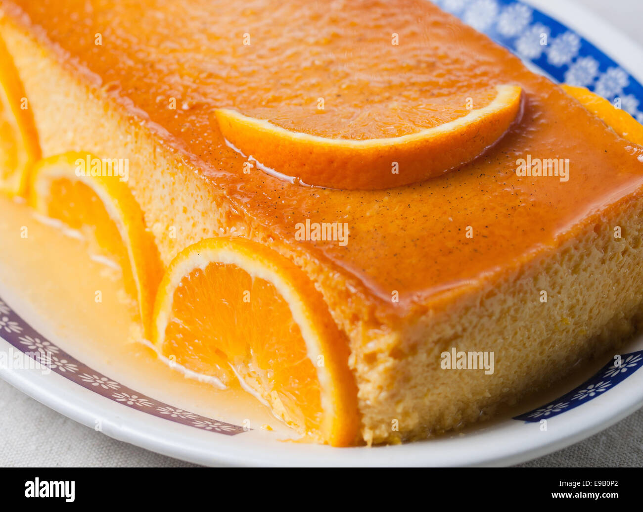 Orange custard in a studio shot. A delicious dessert Stock Photo - Alamy