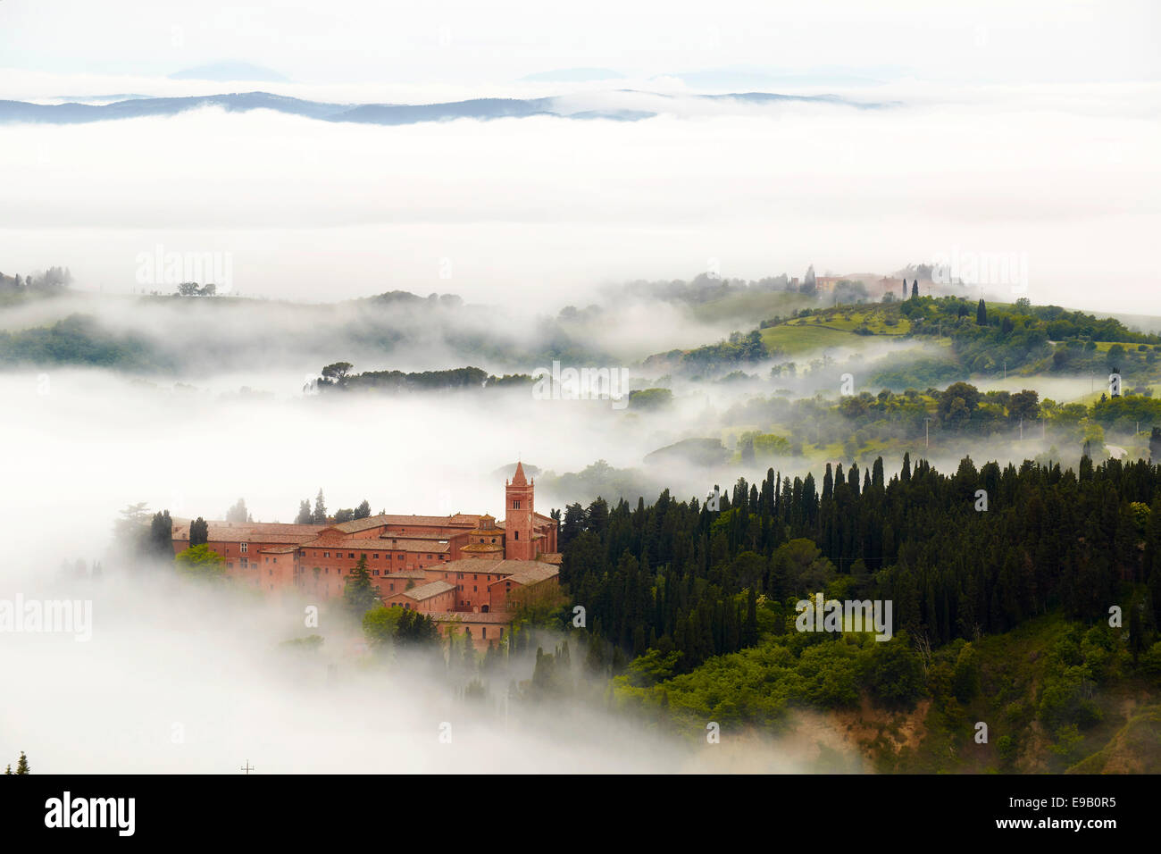 Monte Oliveto Maggiore abbey with mist-shrouded valleys, Chiusure ...